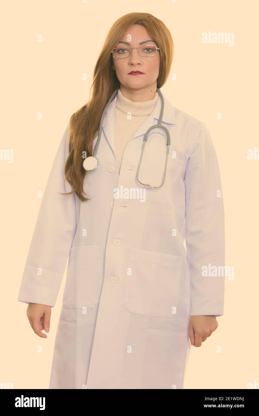 Studio shot of woman doctor standing Stock Photo - Alamy