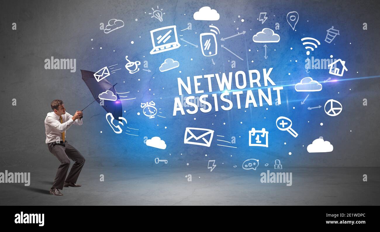 Businessman defending with umbrella from NETWORK ASSISTANT inscription ...