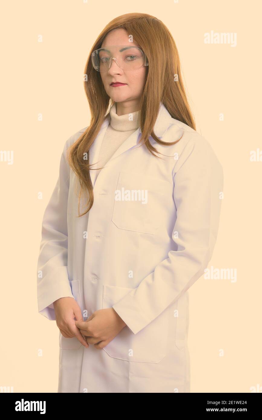 Studio shot of woman doctor standing Stock Photo - Alamy