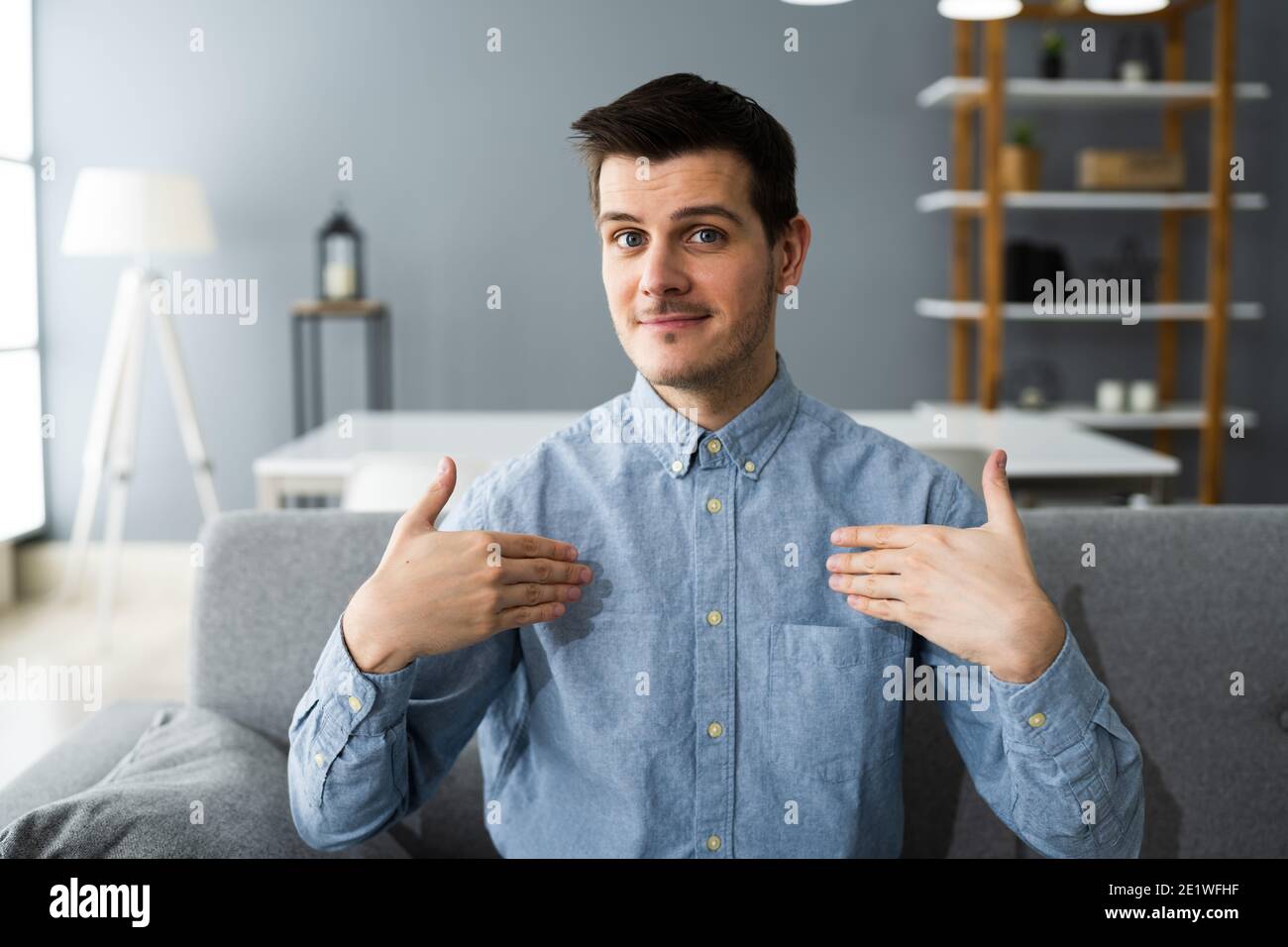Adult Learning Sign Language For Deaf Disabled Stock Photo - Alamy