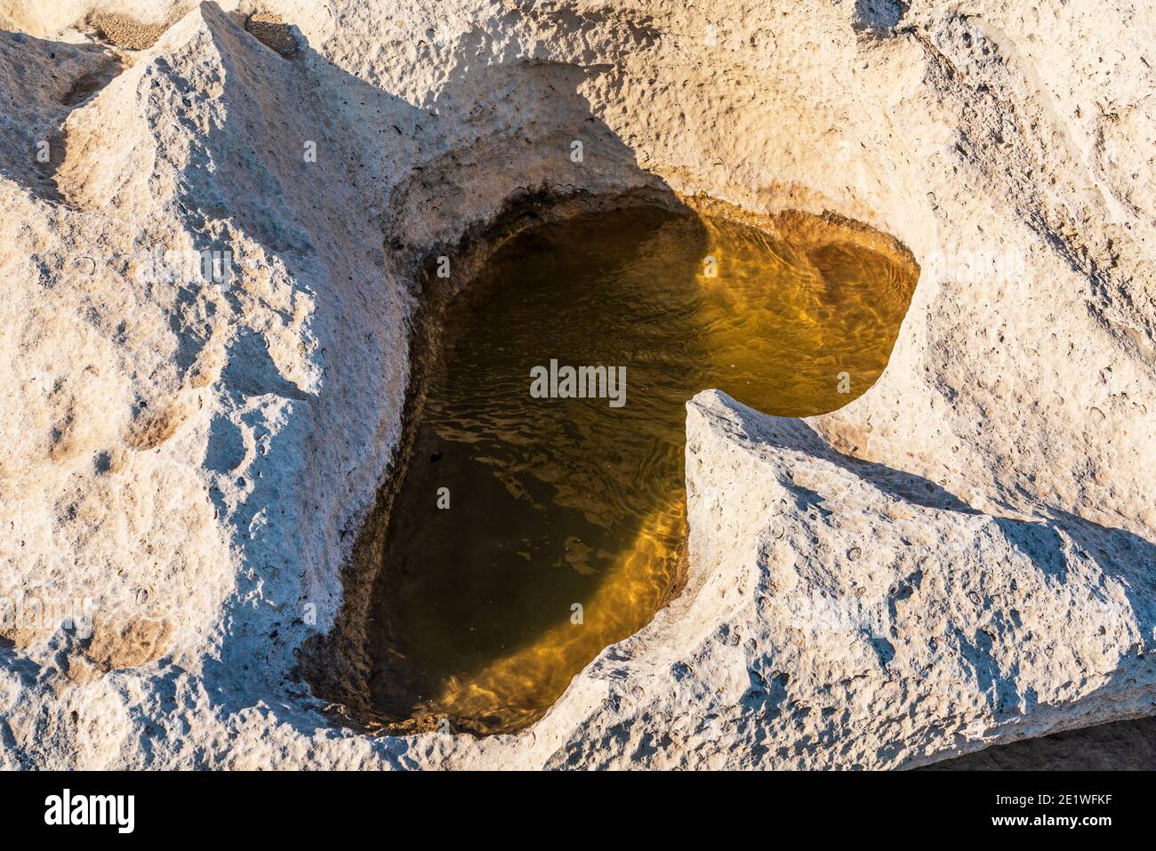 Small puddle in the rock Stock Photo - Alamy