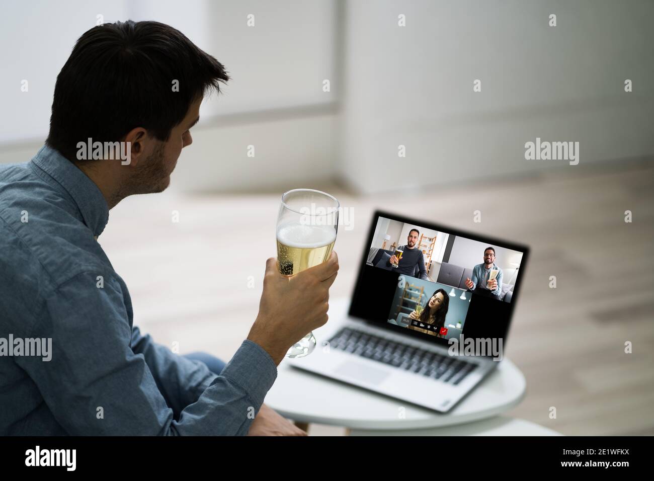 Online Virtual Beer Drinking Party On Laptop Stock Photo - Alamy