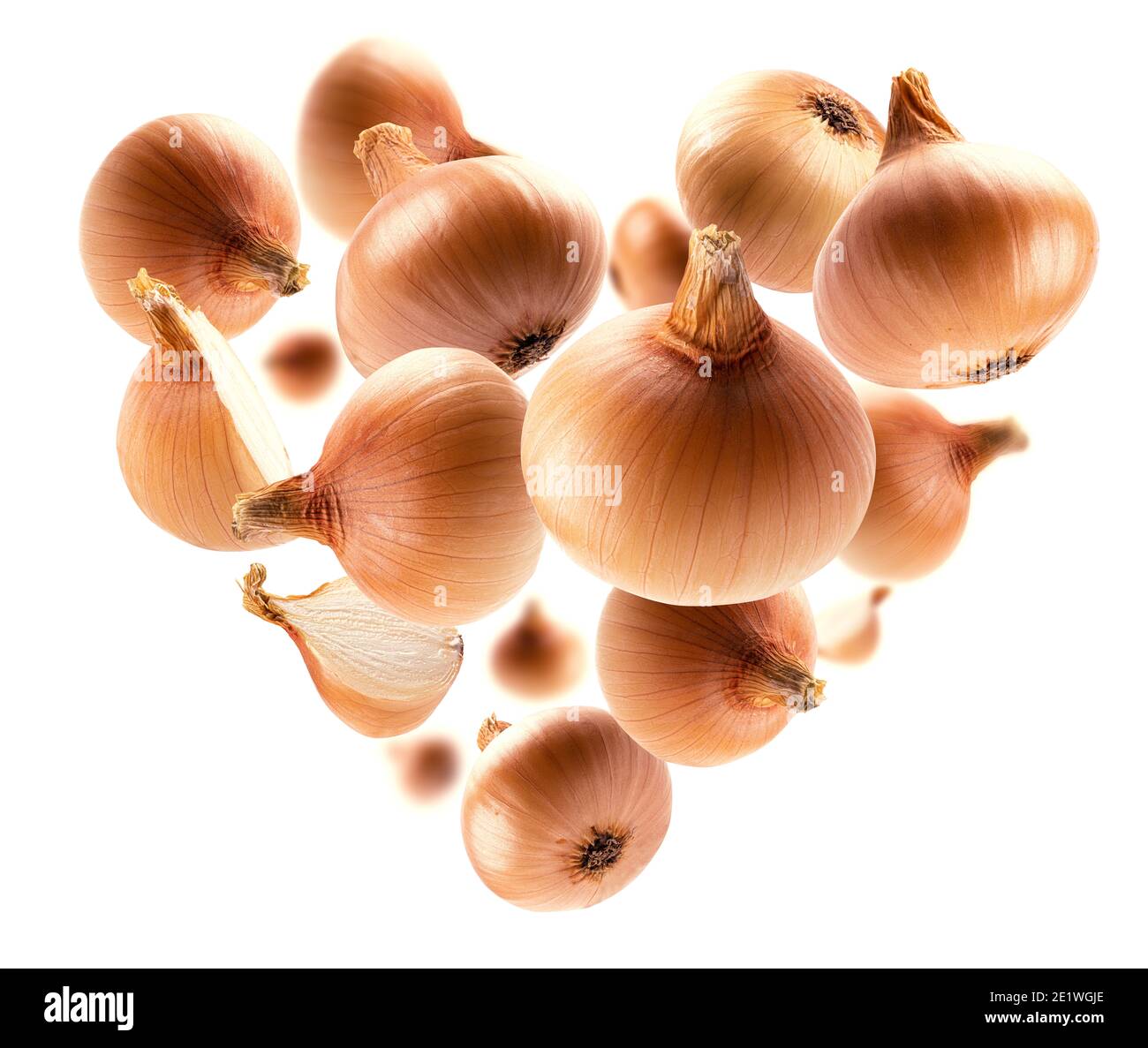 Onion in the shape of a heart on a white background Stock Photo - Alamy
