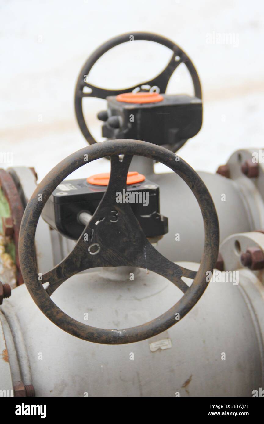 Modern black oil pipe valve wheel. Metal, pipeline and mechanic concept ...