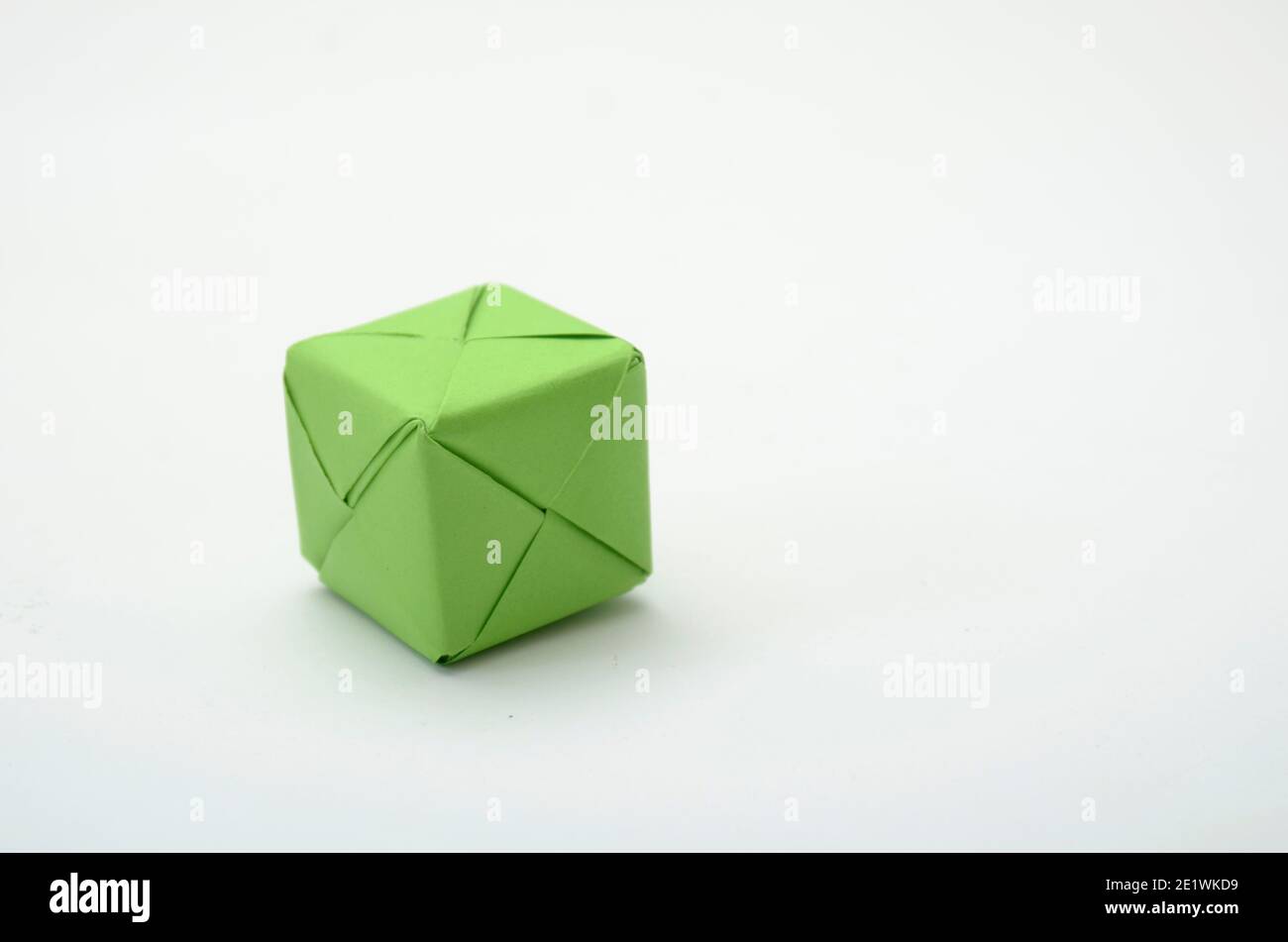 origami box, cube, green color Stock Photo - Alamy