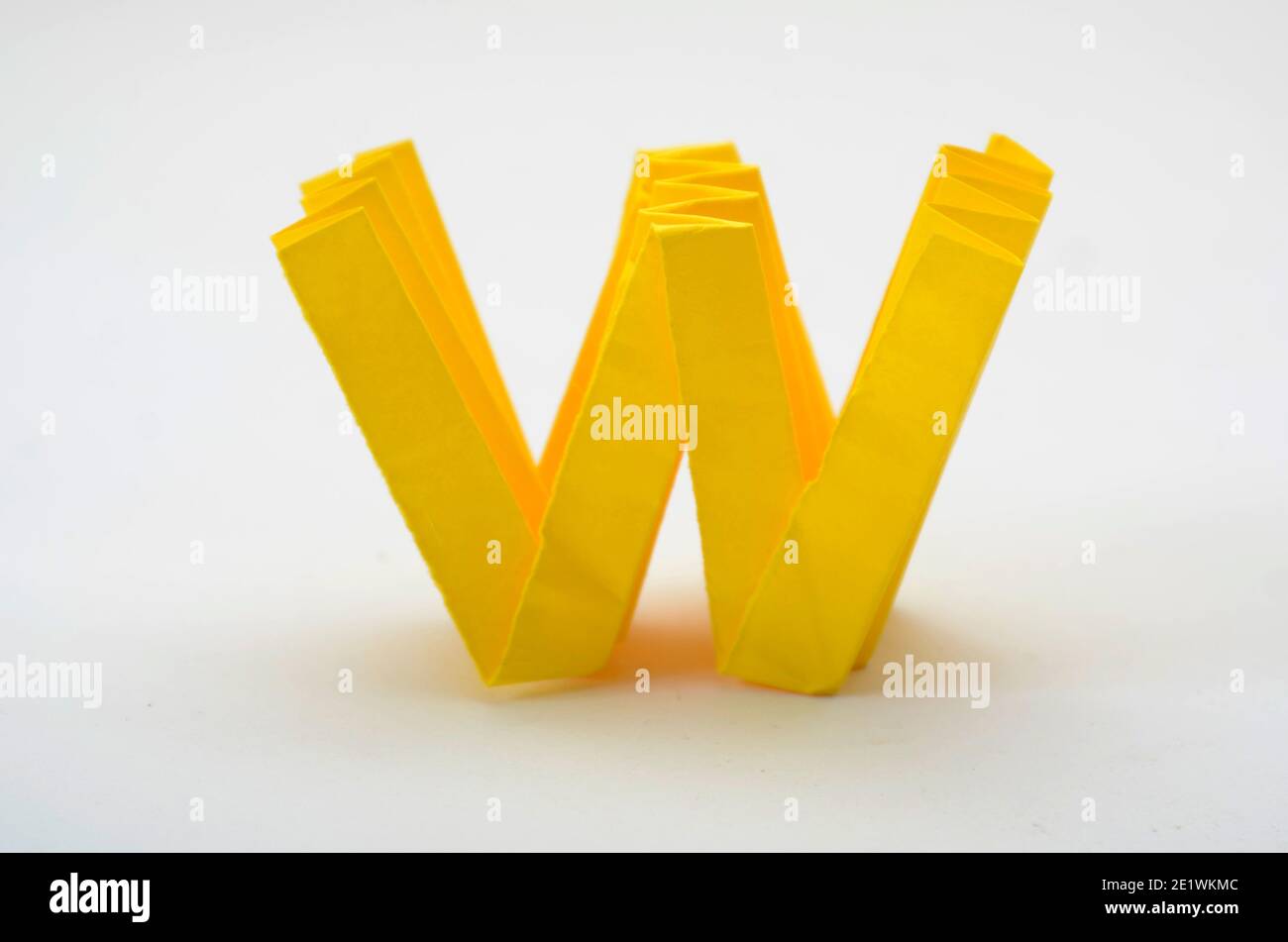 origami in yellow color. Alphabet W. paper folding, creative art Stock ...