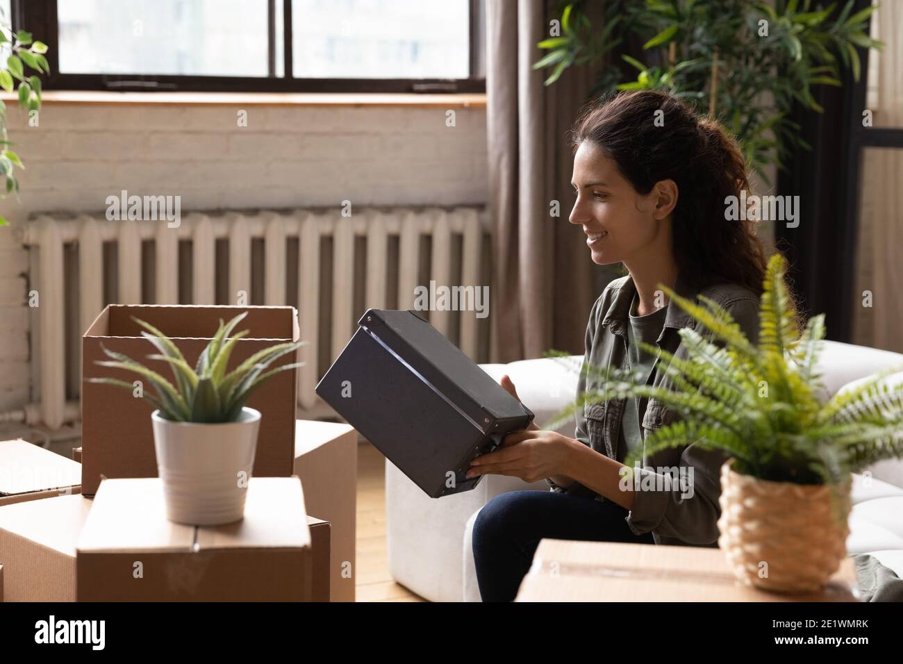 Adult lady moving house hi-res stock photography and images - Alamy