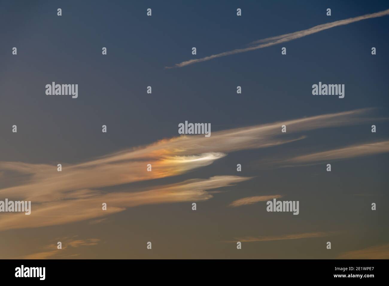 Cirrus cloud formation with sundog Stock Photo - Alamy