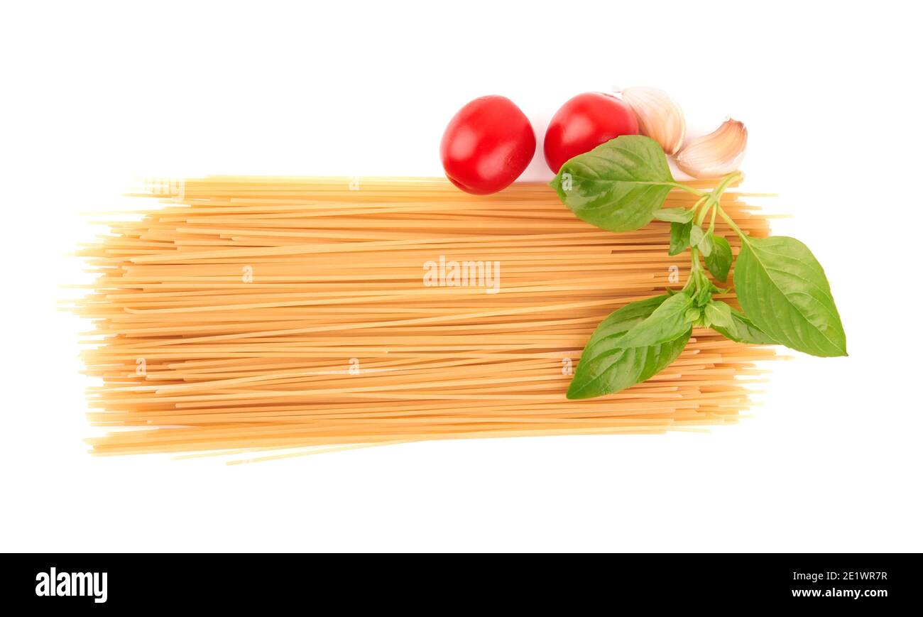 Raw spaghetti isolated on a white background Stock Photo - Alamy