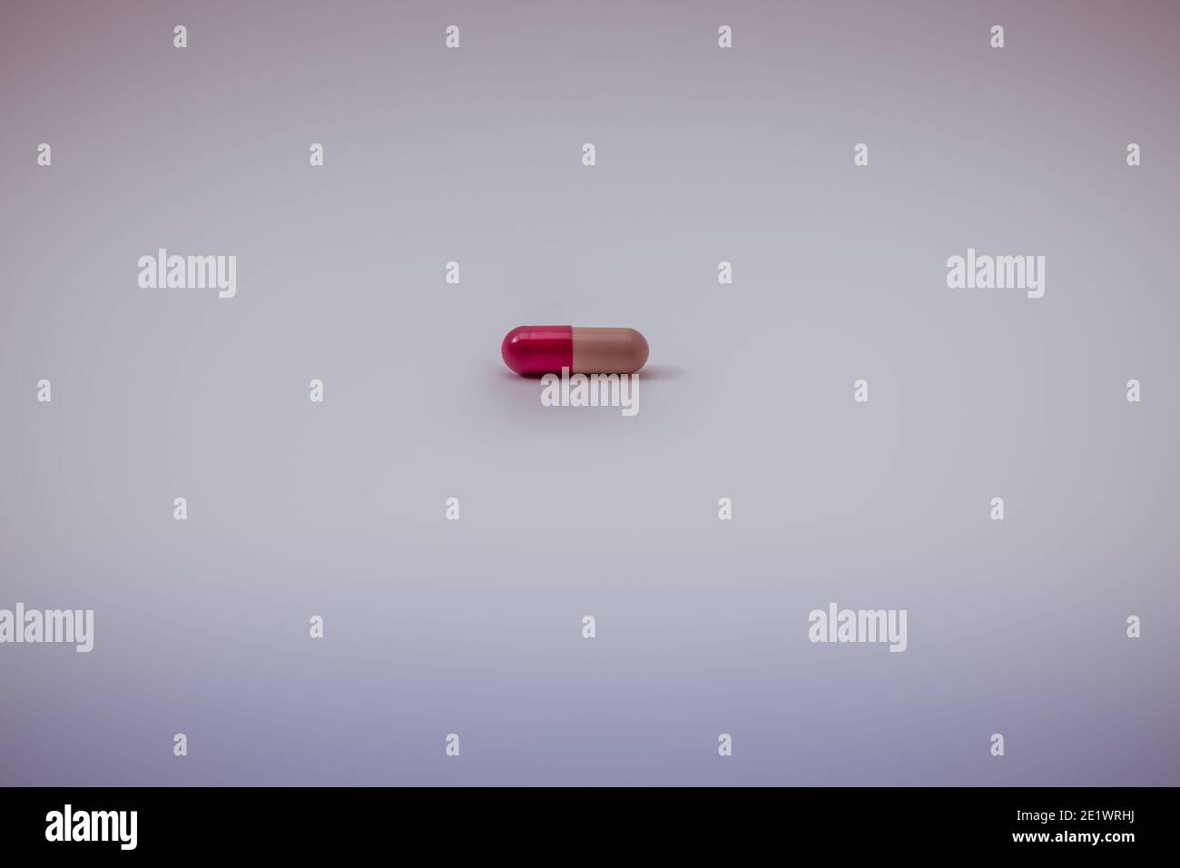 Colorful pill isolated on white background with copy space, side view ...