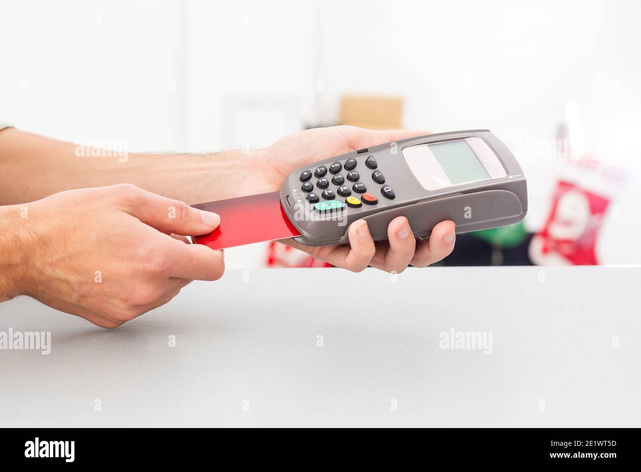 Payment on a trade through contactless card and NFC technology. Front ...