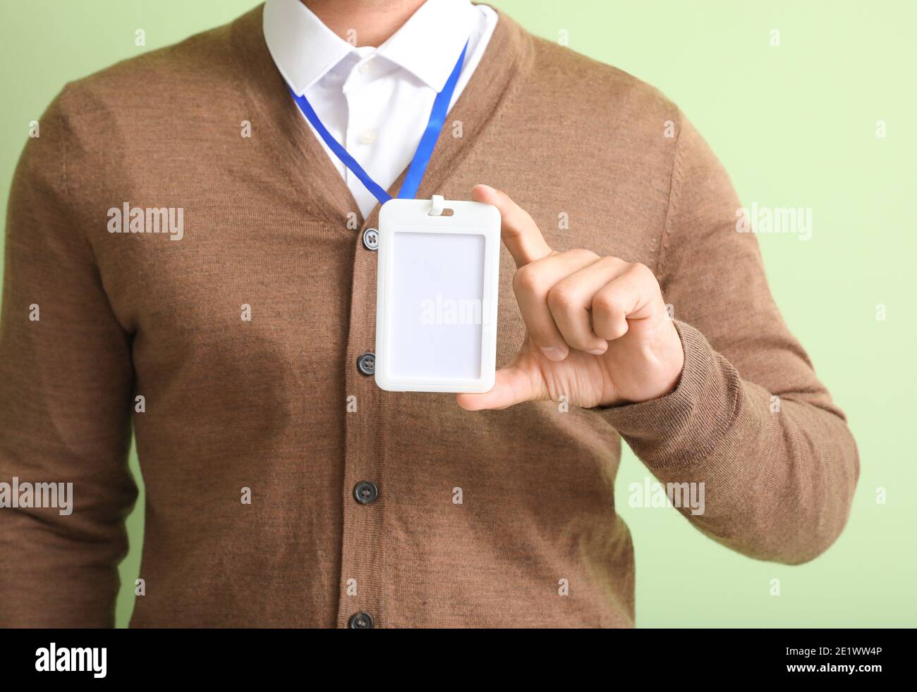 Man holding blank name tag hi-res stock photography and images - Alamy