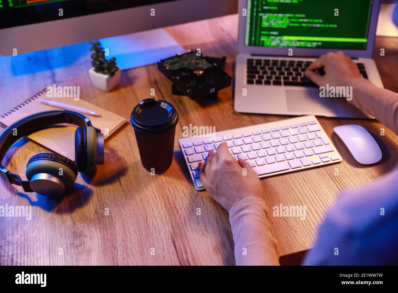 Female programmer working in office Stock Photo - Alamy