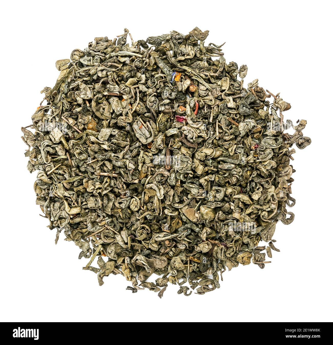 Dry green tea leaves on white background Stock Photo - Alamy