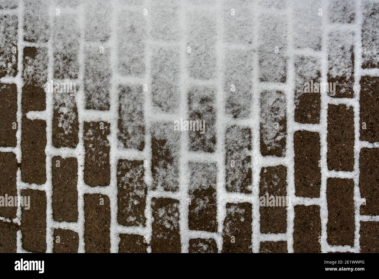 Pathway surface covered of snow Stock Photo - Alamy