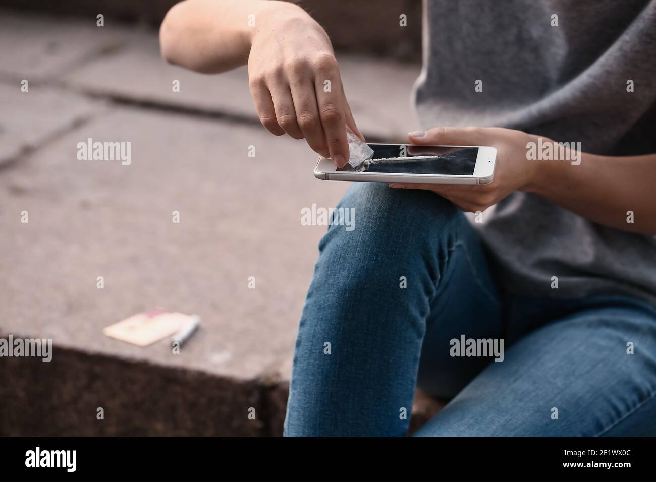 Female junkie taking drugs outdoors, closeup Stock Photo - Alamy