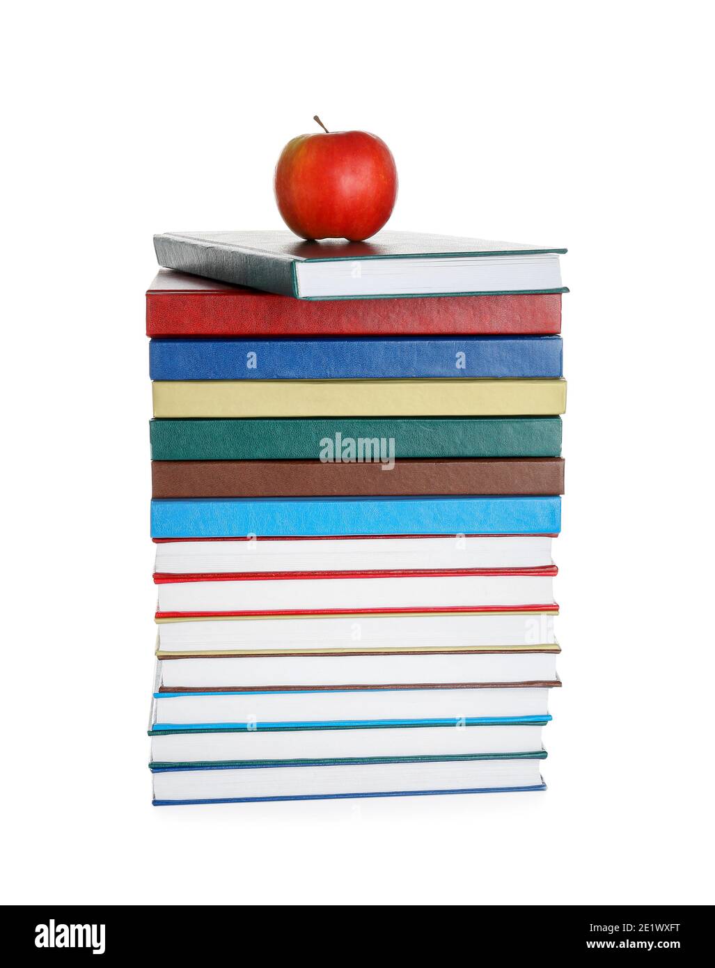 Stack of books and apple on white background Stock Photo - Alamy