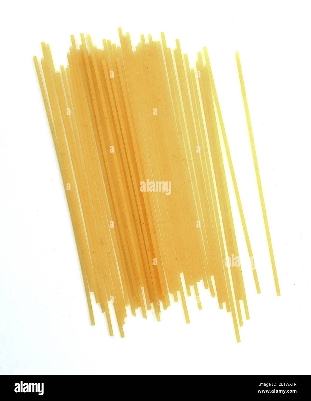 Spaghetti - yellow pasta, ready for cooking. isolated on the white ...