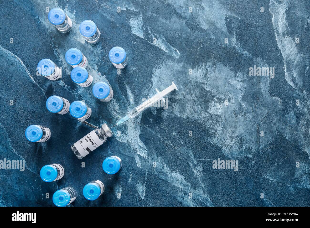 Vaccine for immunization against COVID-19 on color background Stock ...