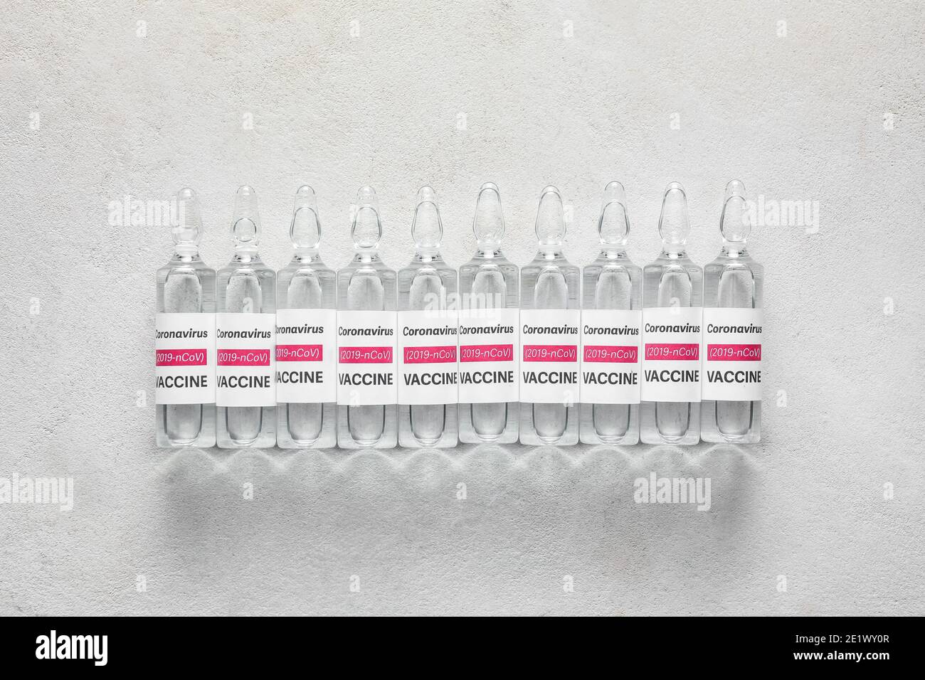 Vaccine for immunization against COVID-19 on light background Stock ...