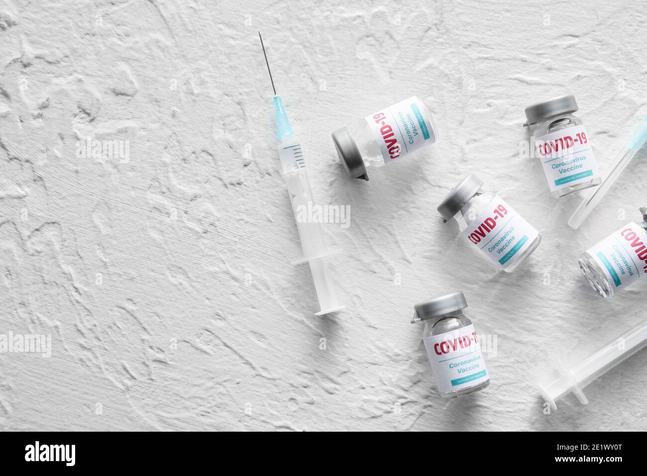 Vaccine for immunization against COVID-19 on light background Stock ...