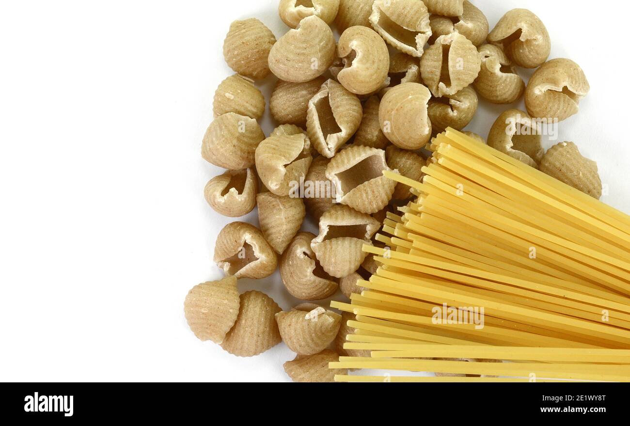 Spaghetti - yellow pasta, ready for cooking. isolated on the white ...