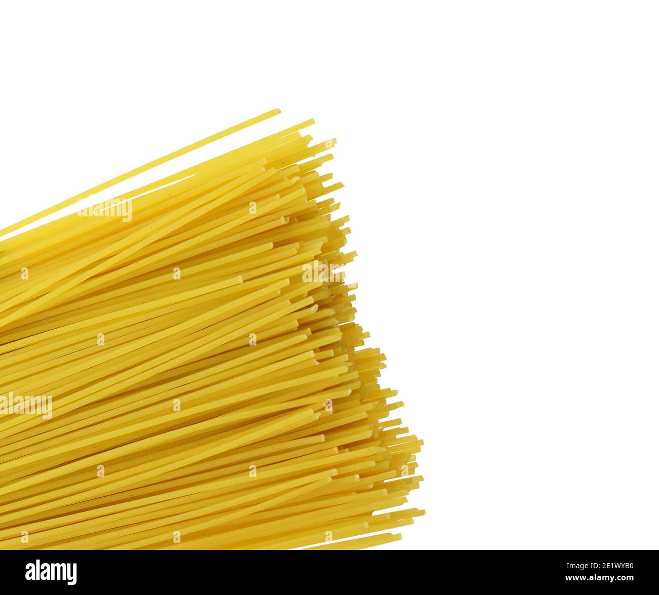 Spaghetti - yellow pasta, ready for cooking. isolated on the white ...