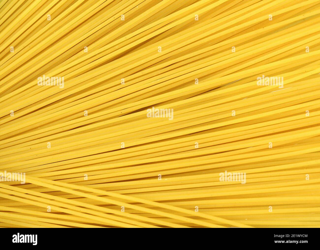Spaghetti - yellow pasta, ready for cooking. isolated on the white ...