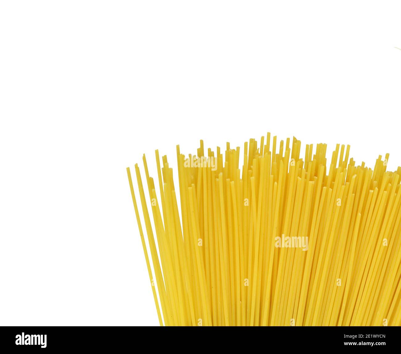 Spaghetti - yellow pasta, ready for cooking. isolated on the white ...