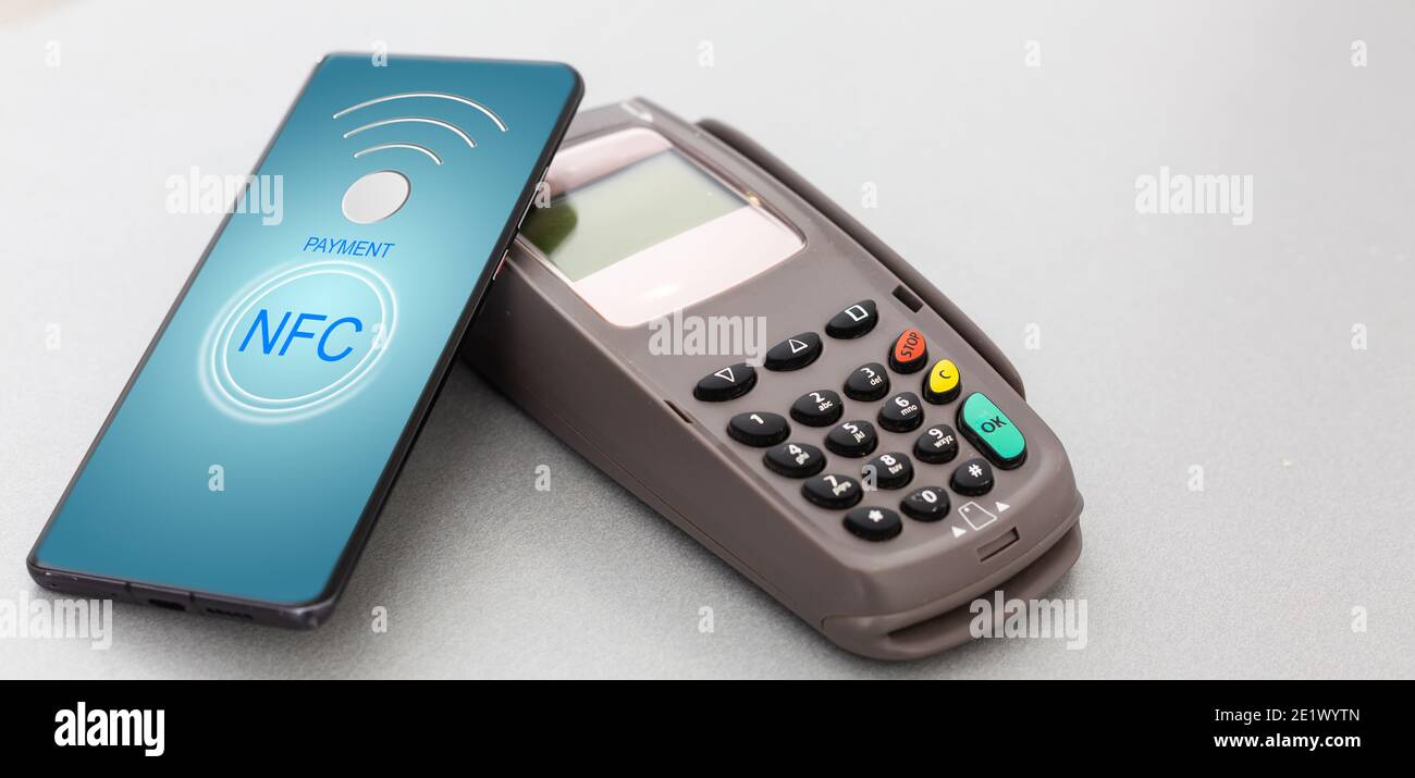 terminal for contactless payment with smartphone on white background ...