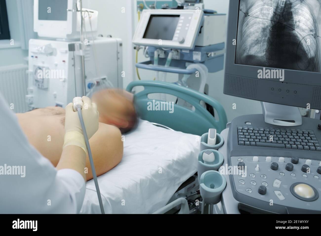 Ultrasound examination of patient in hospital ward Stock Photo - Alamy