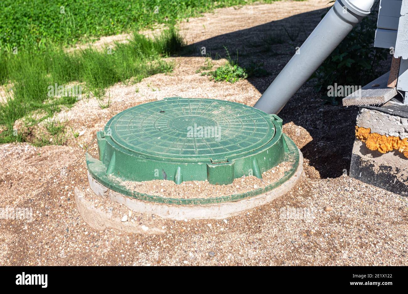 Covered sewer manhole of rural septic tank with cover, sewage system ...