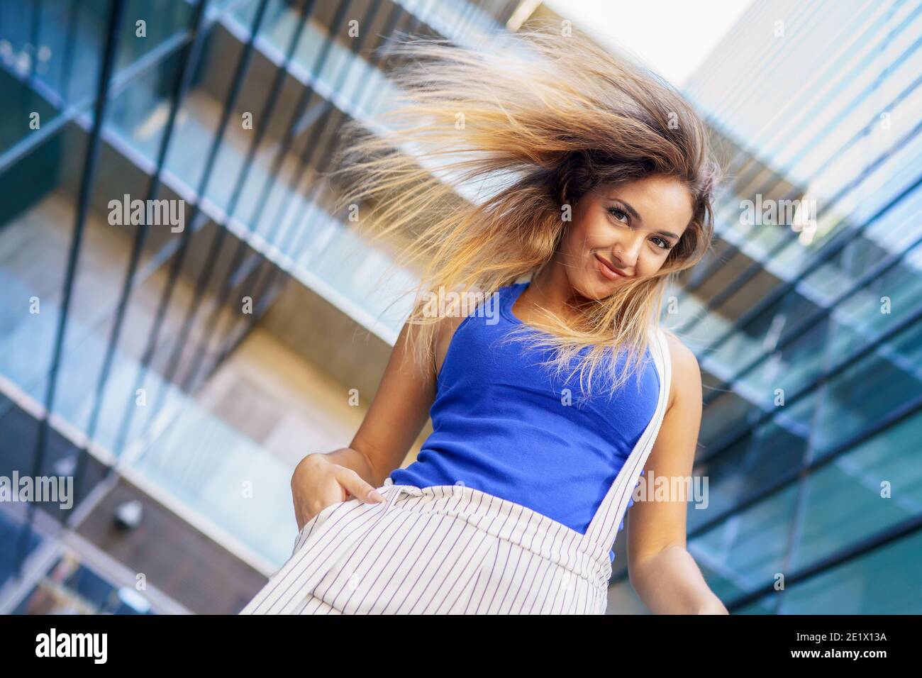 View from above of young girl moving her hair wild Stock Photo - Alamy