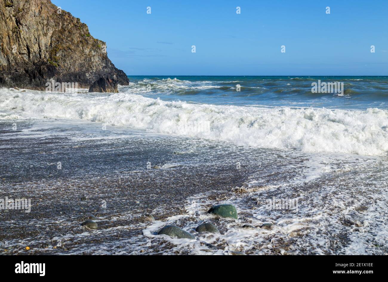 Sunny Day on a Rocky Rugged Beach looking out at ocean in the Copper ...