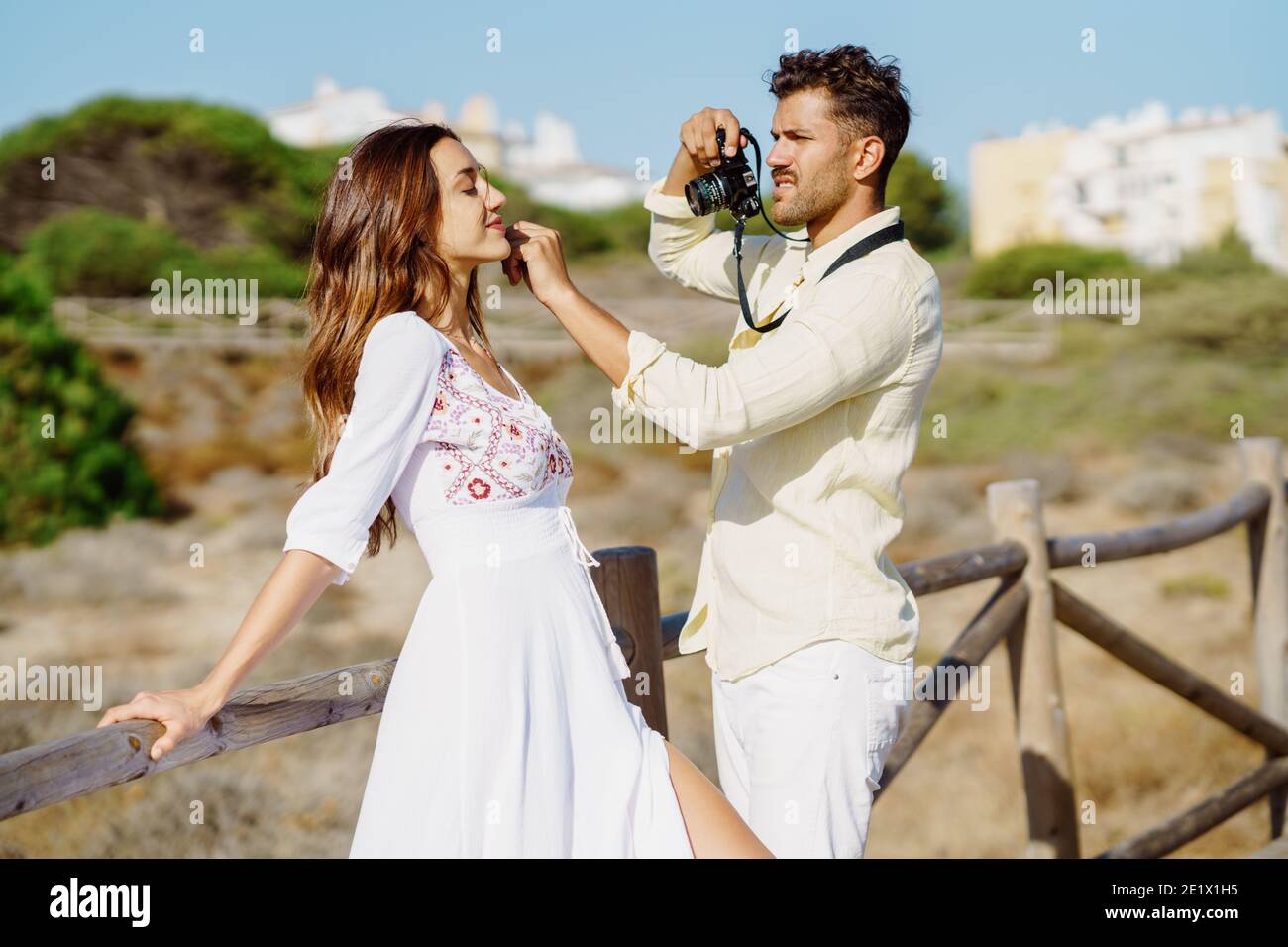 Man photographing his girlfriend hi-res stock photography and images ...