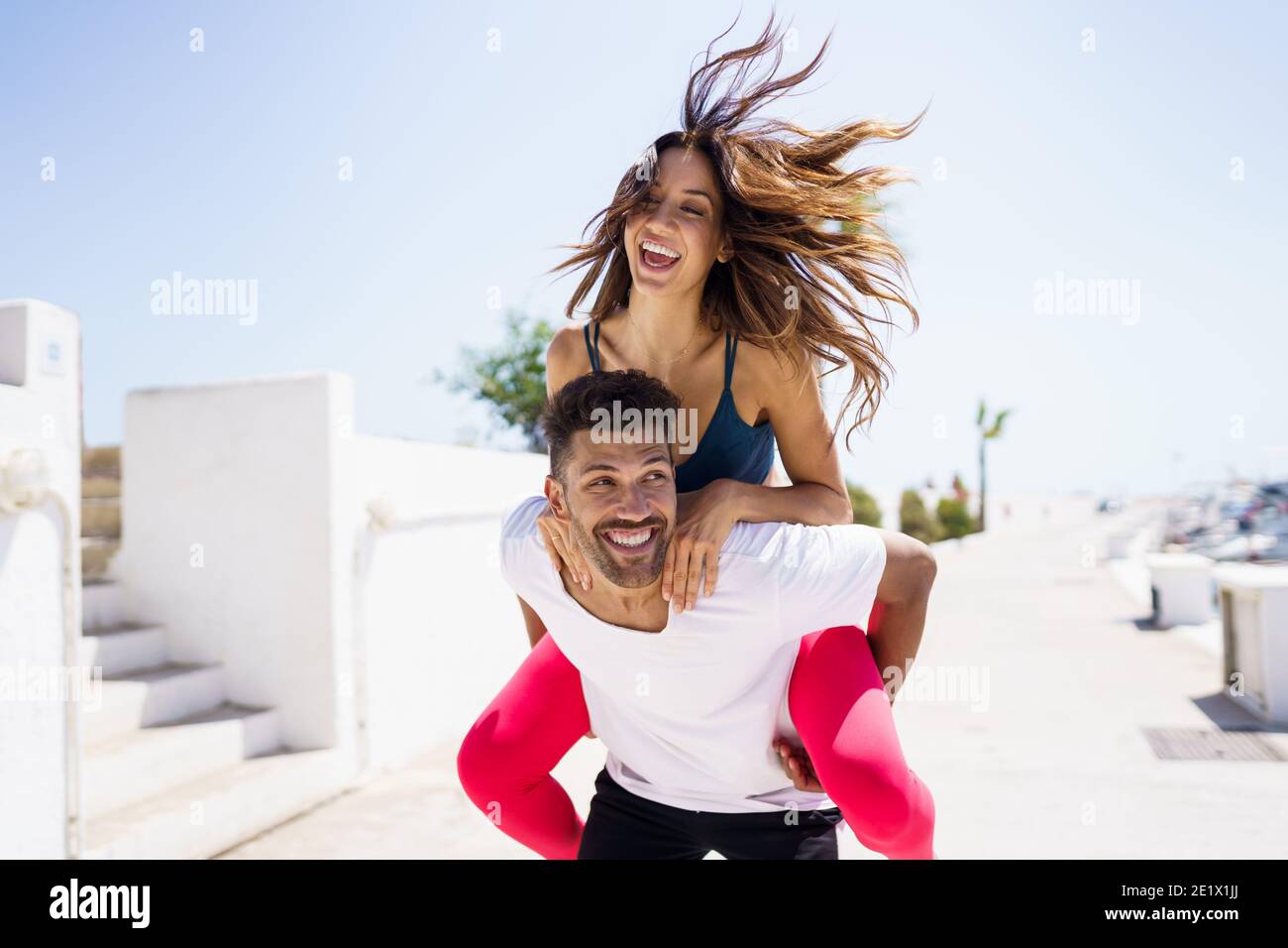Piggyback couple hi-res stock photography and images - Alamy