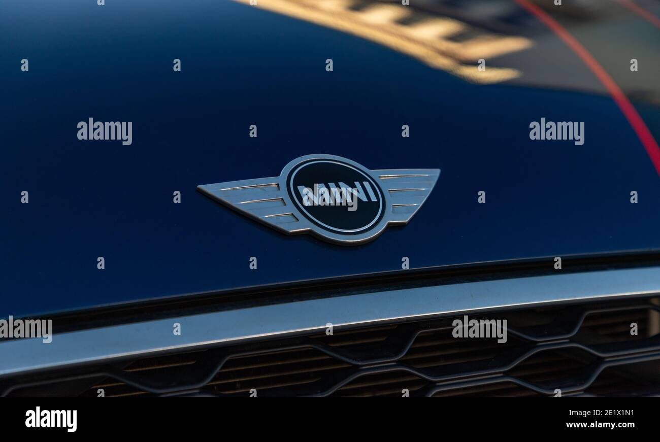 A close-up picture of the Mini logo on the hood of a car Stock Photo ...