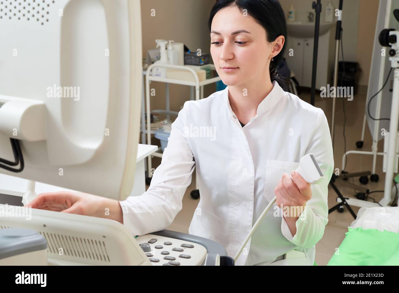 Gynecologist doing ultrasound scan in modern clinic Stock Photo - Alamy