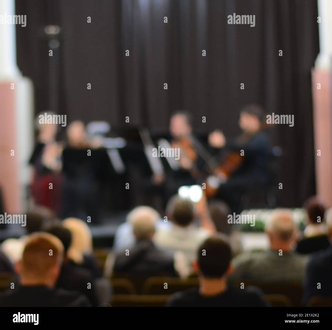 abstract blurred image. Actor violinist playing the violin strings ...
