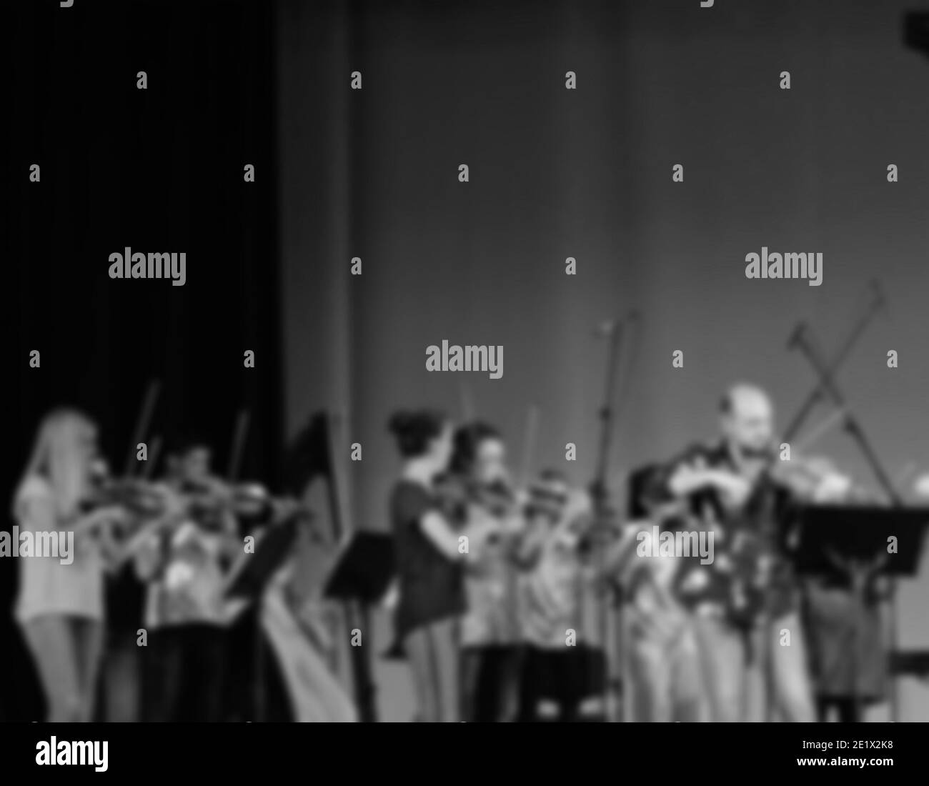 abstract blurred image. Actor violinist playing the violin strings ...