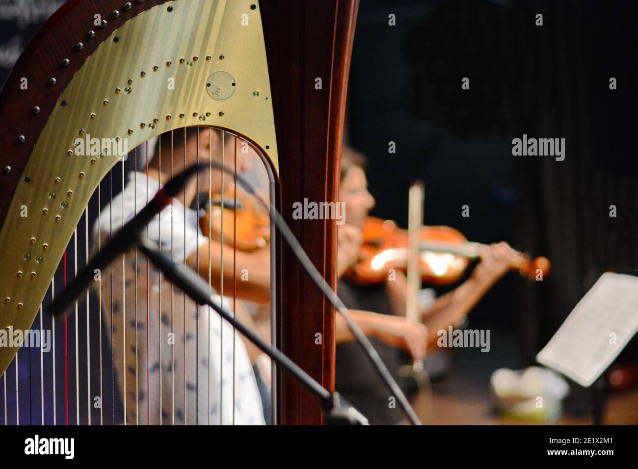 abstract blurred image. Actor violinist playing the violin strings ...