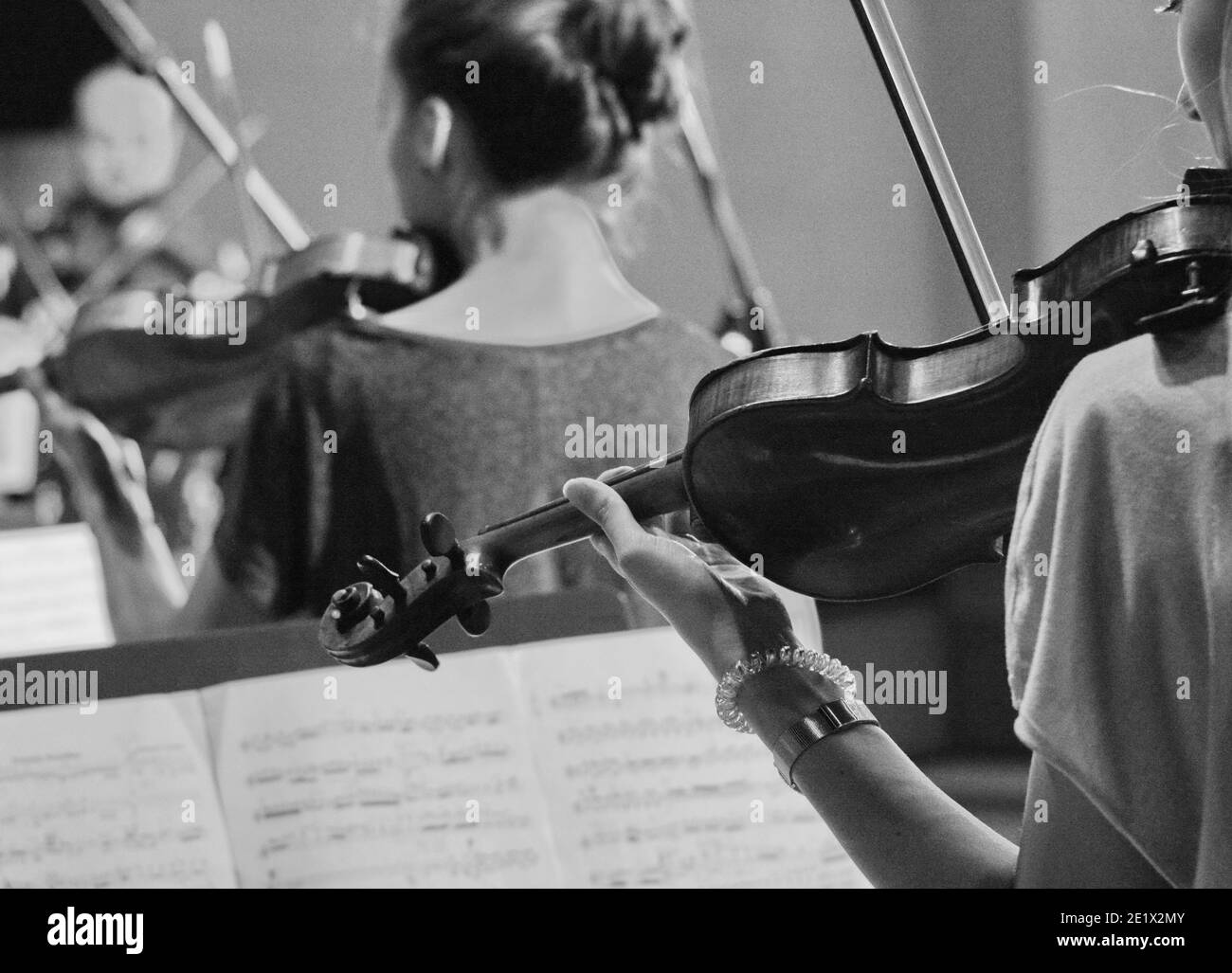 abstract blurred image. Actor violinist playing the violin strings ...