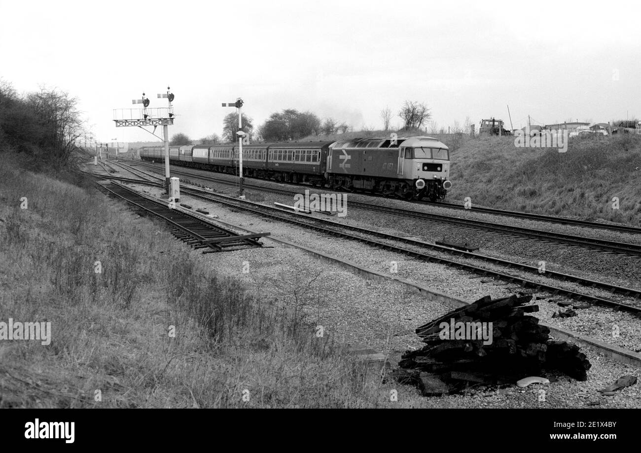 Class 47 diesel locomotive No. 47457 "Ben Line" heads a passenger train ...