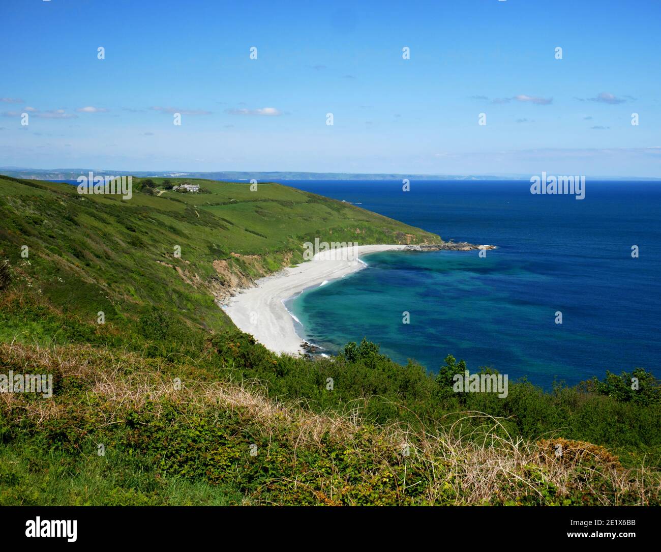 Vault Beach near Gorran Haven, Cornwall. Lamledra House in the distance ...