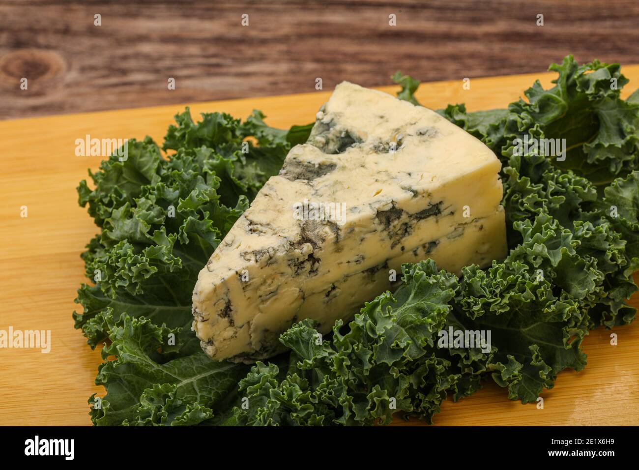 Dairy Blue cheese triangle with mold Stock Photo - Alamy