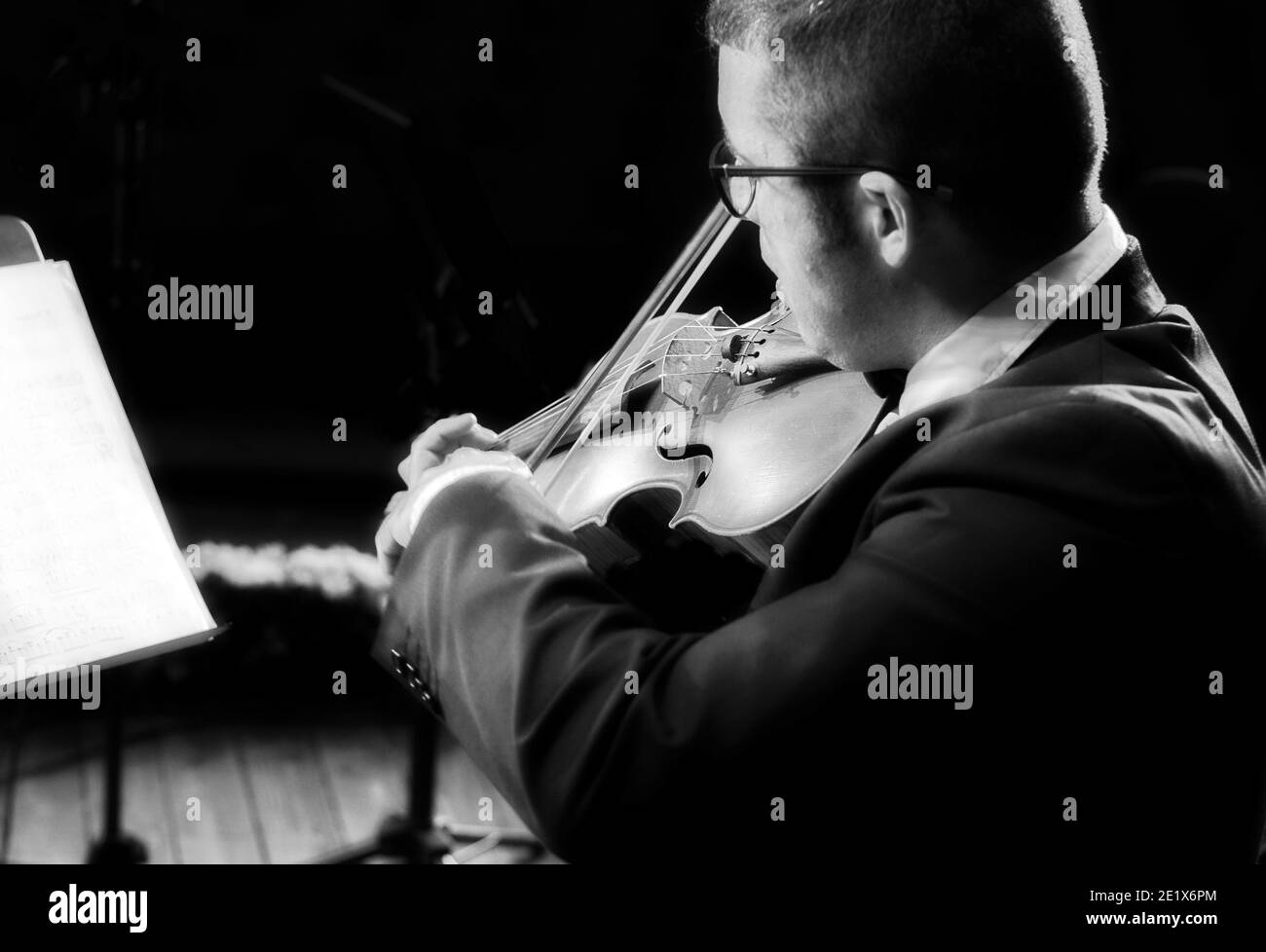 Playing a classic violin Black and White Stock Photos & Images - Alamy