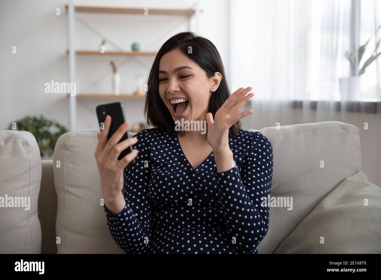 Smiling happy millennial asian hi-res stock photography and images - Alamy