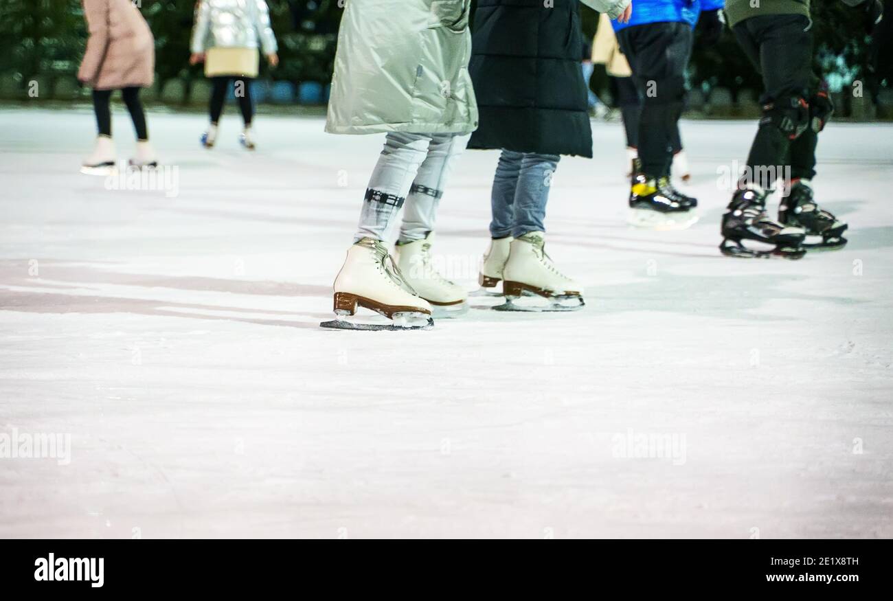 Group people ice skating on hi-res stock photography and images - Alamy