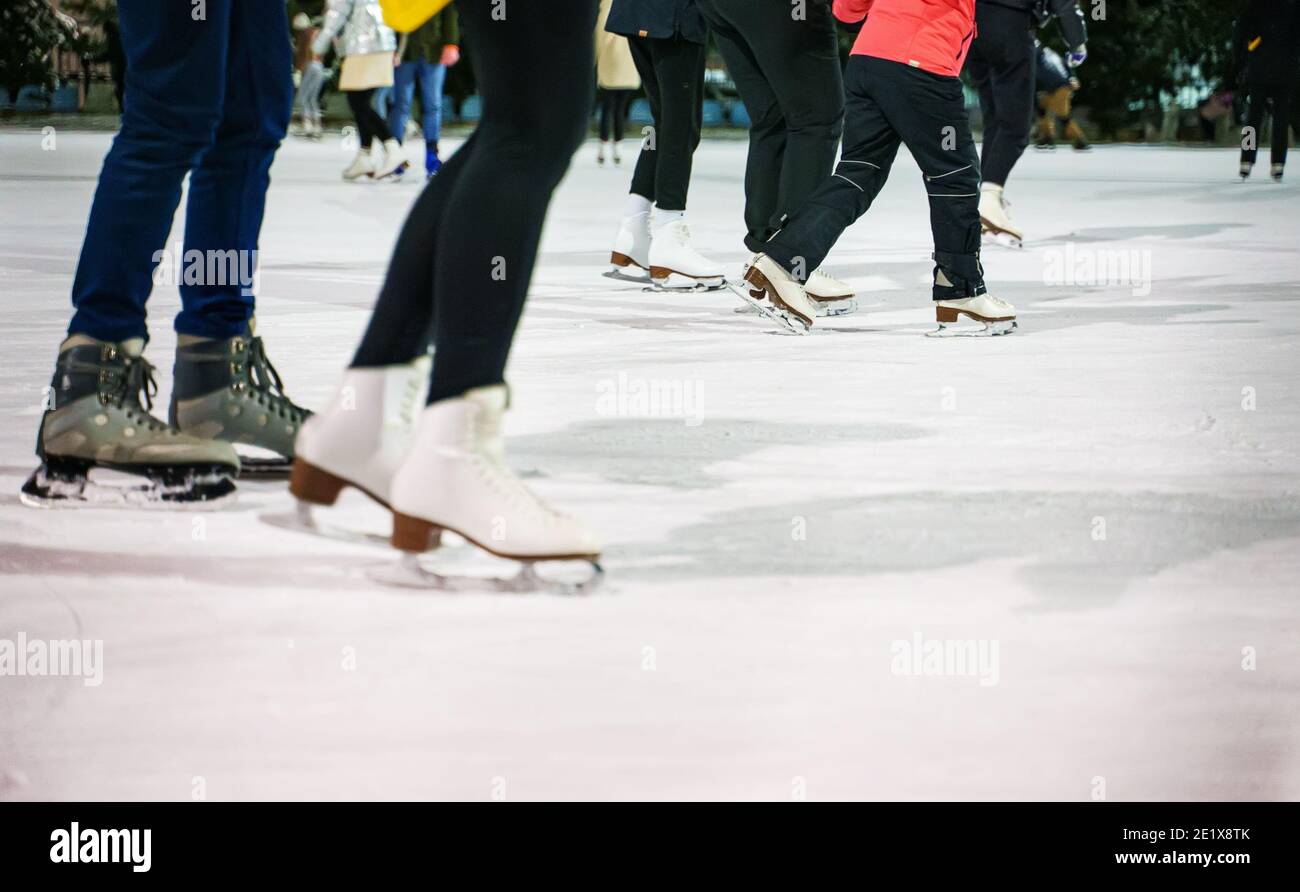 People ice skating on the ice rink in winter Stock Photo - Alamy