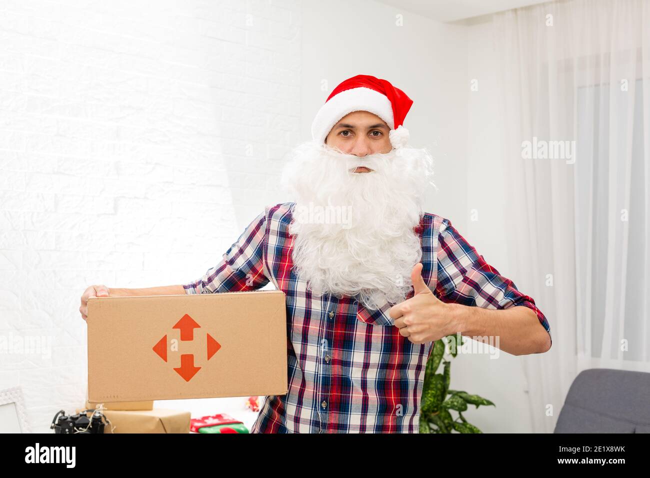 Kyiv, Ukraine - December 16, 2020 : Santa Claus with gift boxes with ...